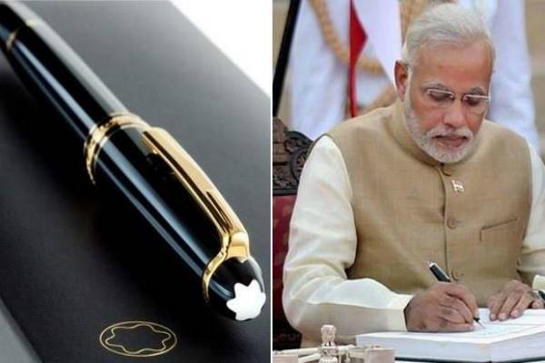 PM मोदी के पेन की कीमत जानेंगे तो रह जाएंगे हैरान - pm modi is used ...
